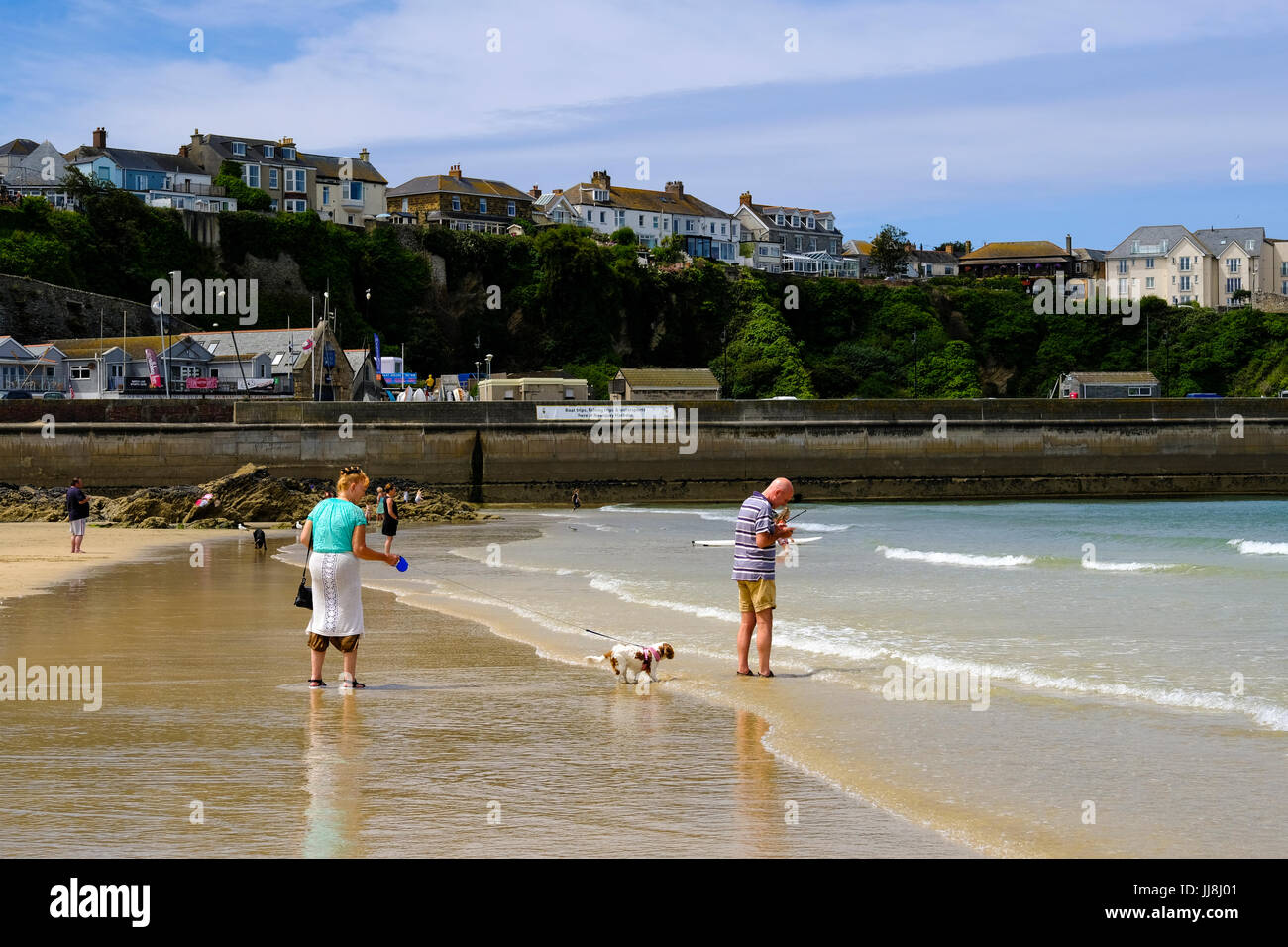 Couple dog cornwall beach summer hi-res stock photography and images ...