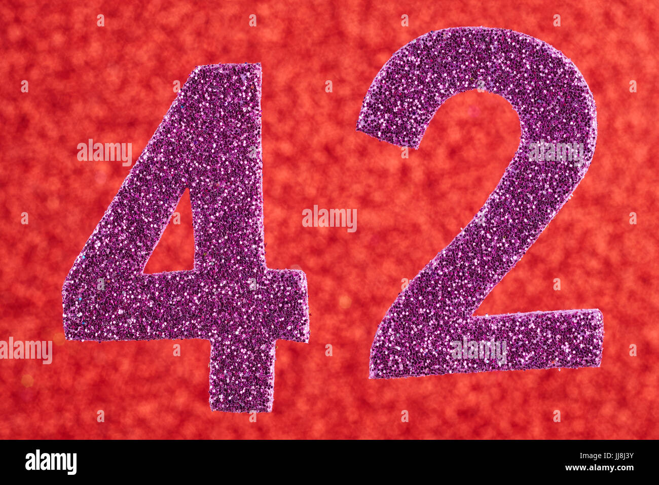 Number forty-two purple color over a red background. Anniversary ...
