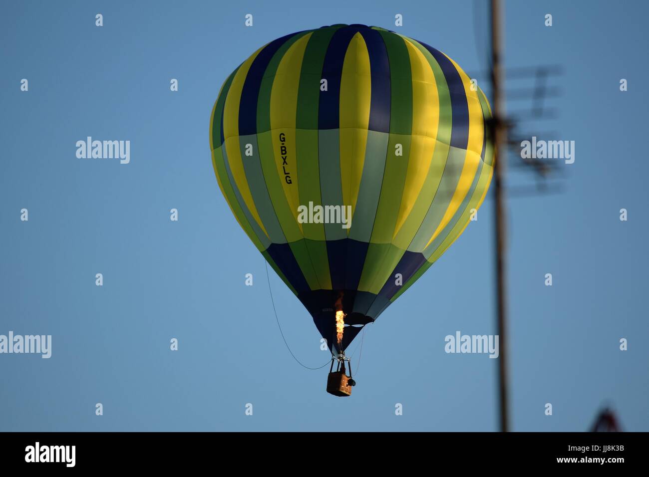 hot air balloon rising Stock Photo - Alamy