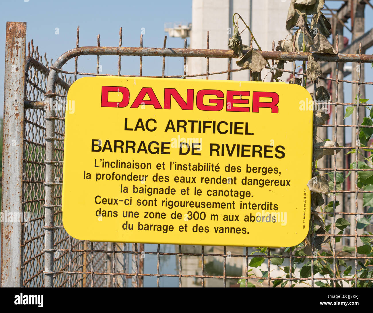 Warning sign adjacent to the hydro electric dam and power station at ...