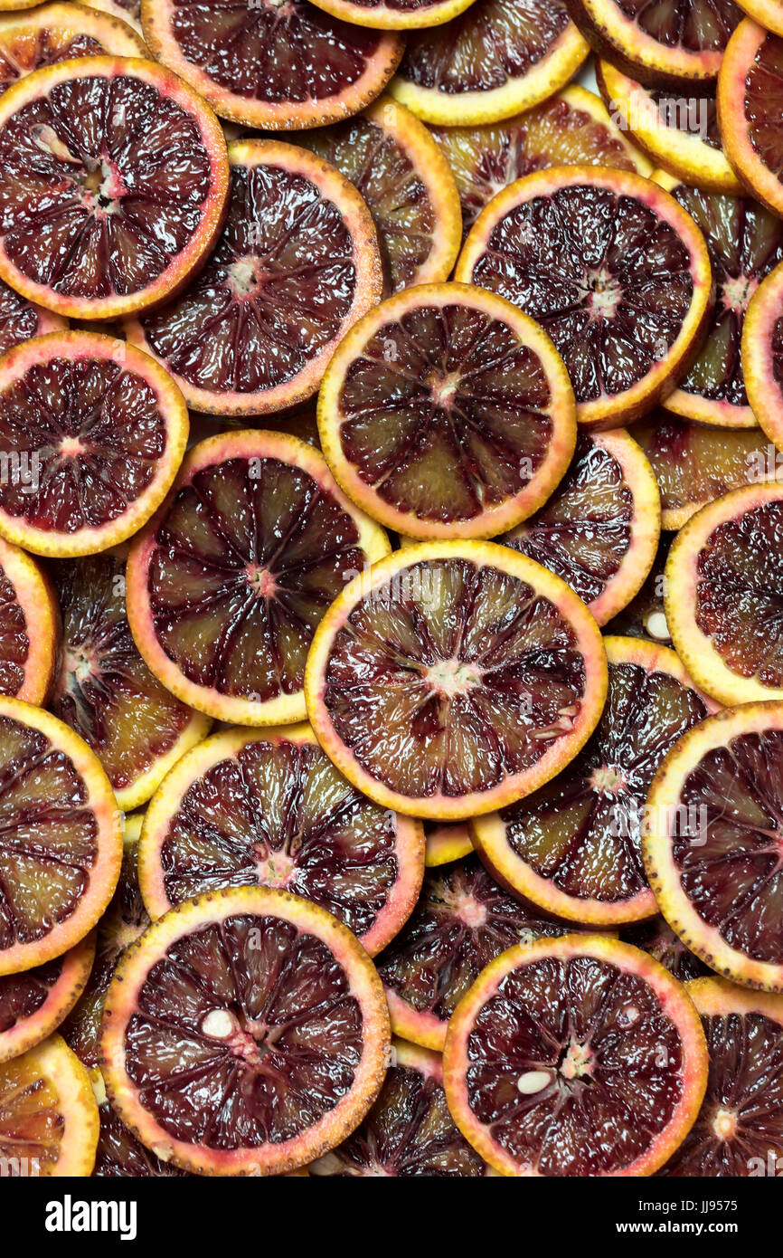 Background of fresh sliced citrus fruits close-up Stock Photo - Alamy