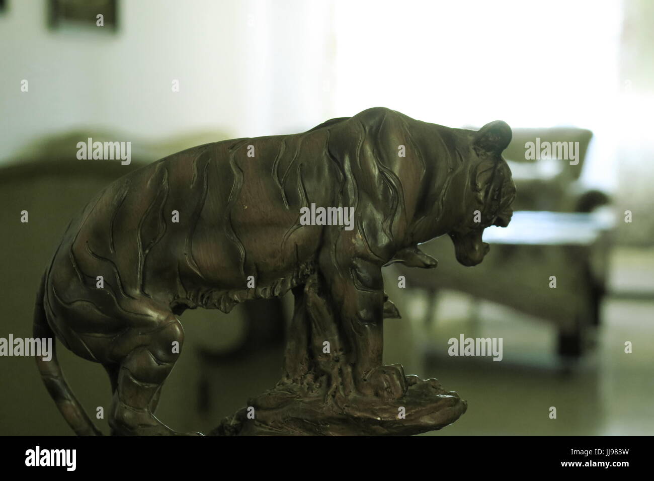 Tiger figure, handmade carving Stock Photo - Alamy