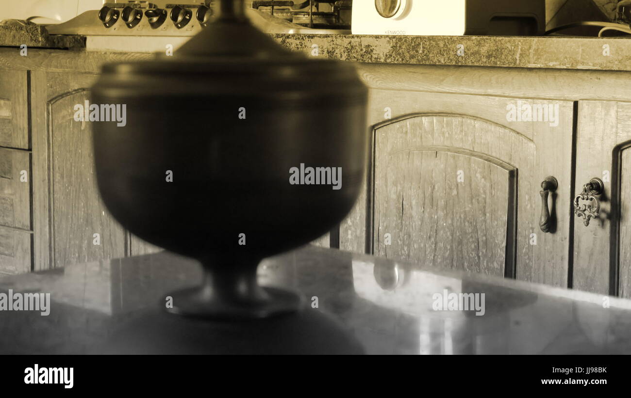 grinding pot on table closed Stock Photo - Alamy