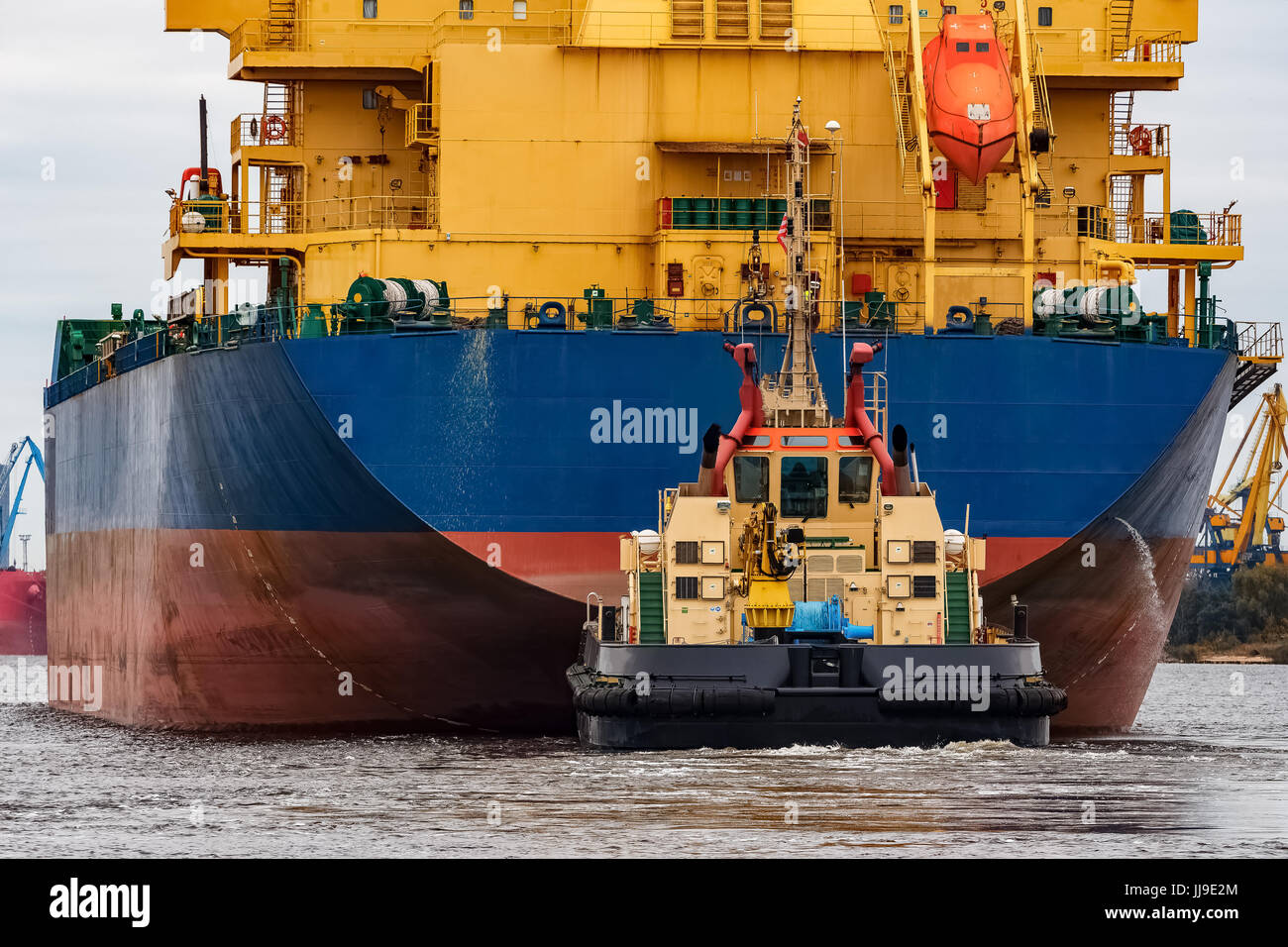 Blue cargo ship entering the port of Riga, Europe Stock Photo - Alamy