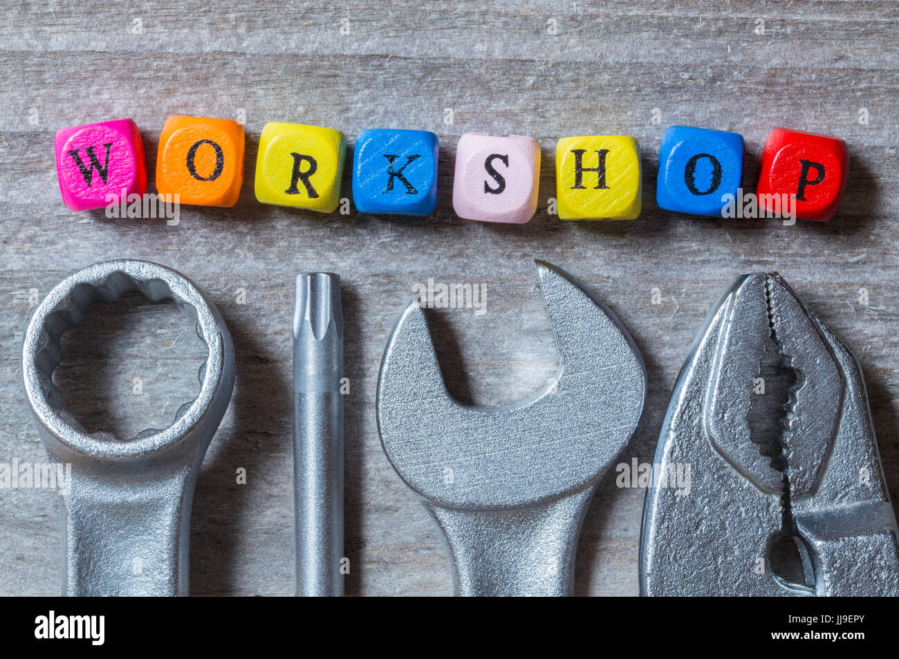 Workshop letter cube and tool on gray wood visualization Stock Photo ...