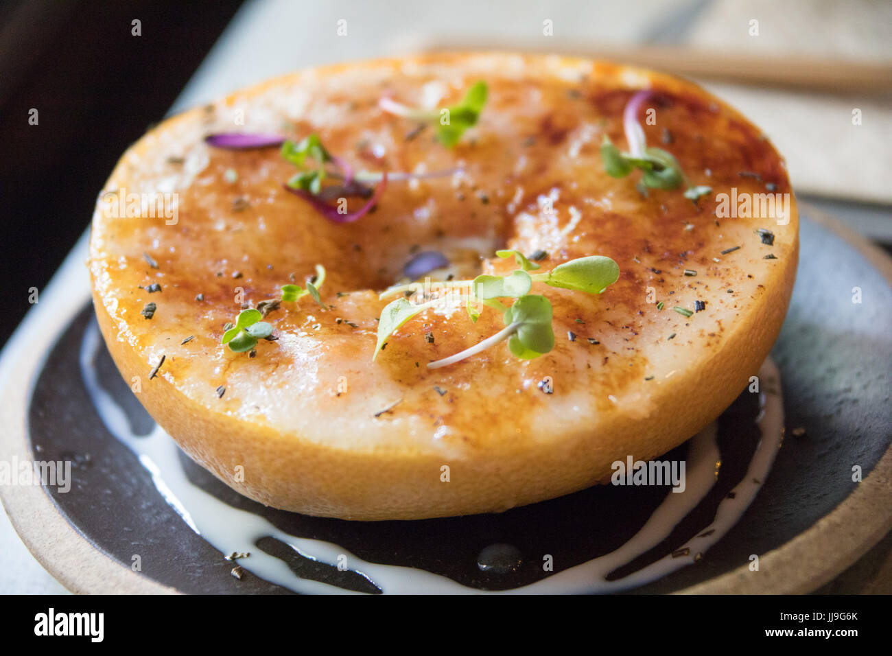 Grapefruit with coconut milk, carmelized brûlée, rosemary at Thursday ...