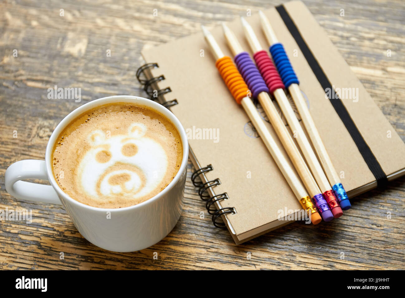 Coffee, pencils and notebook Stock Photo - Alamy