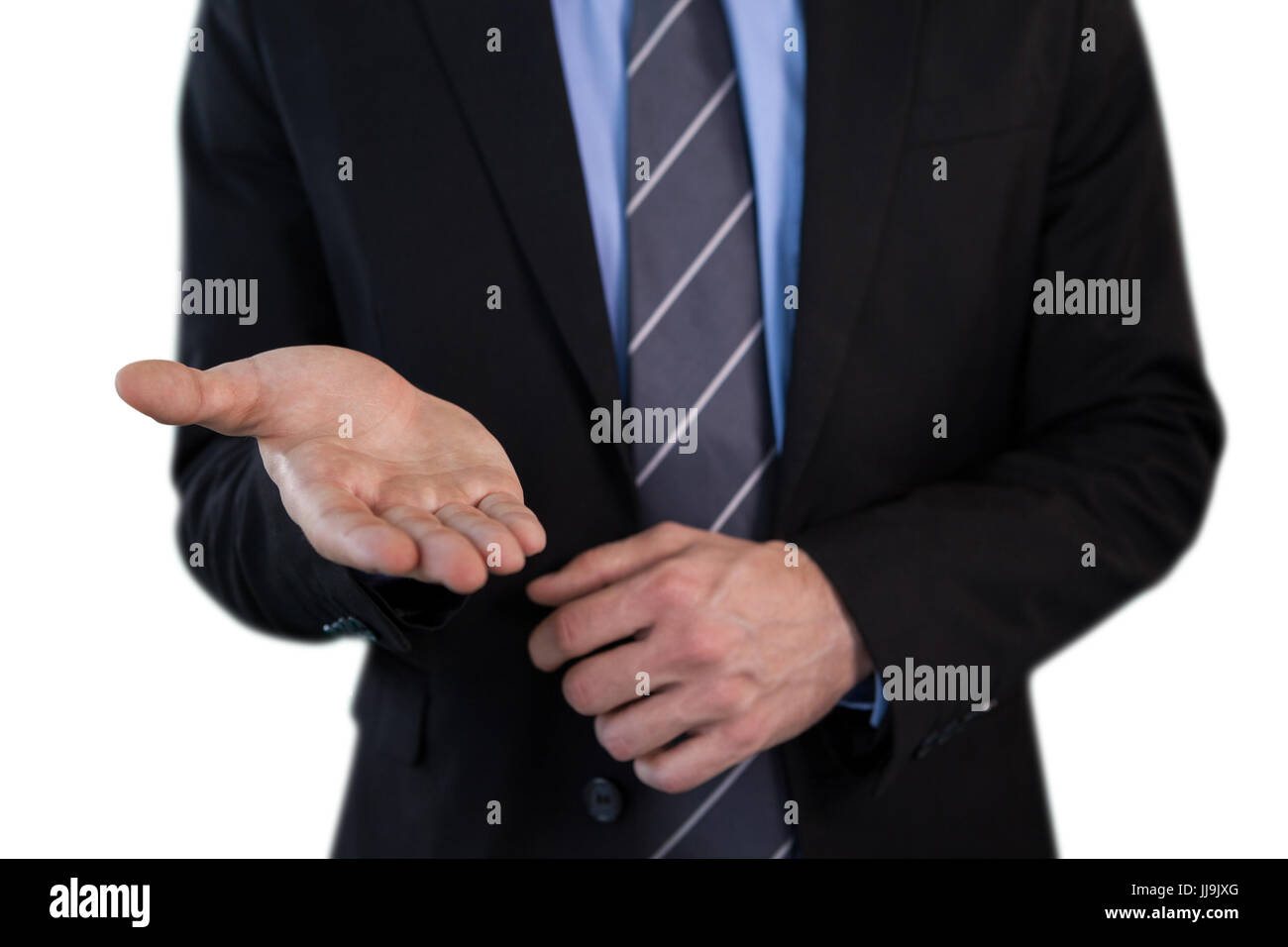 Mid section of businessman advertising invisible product while standing ...
