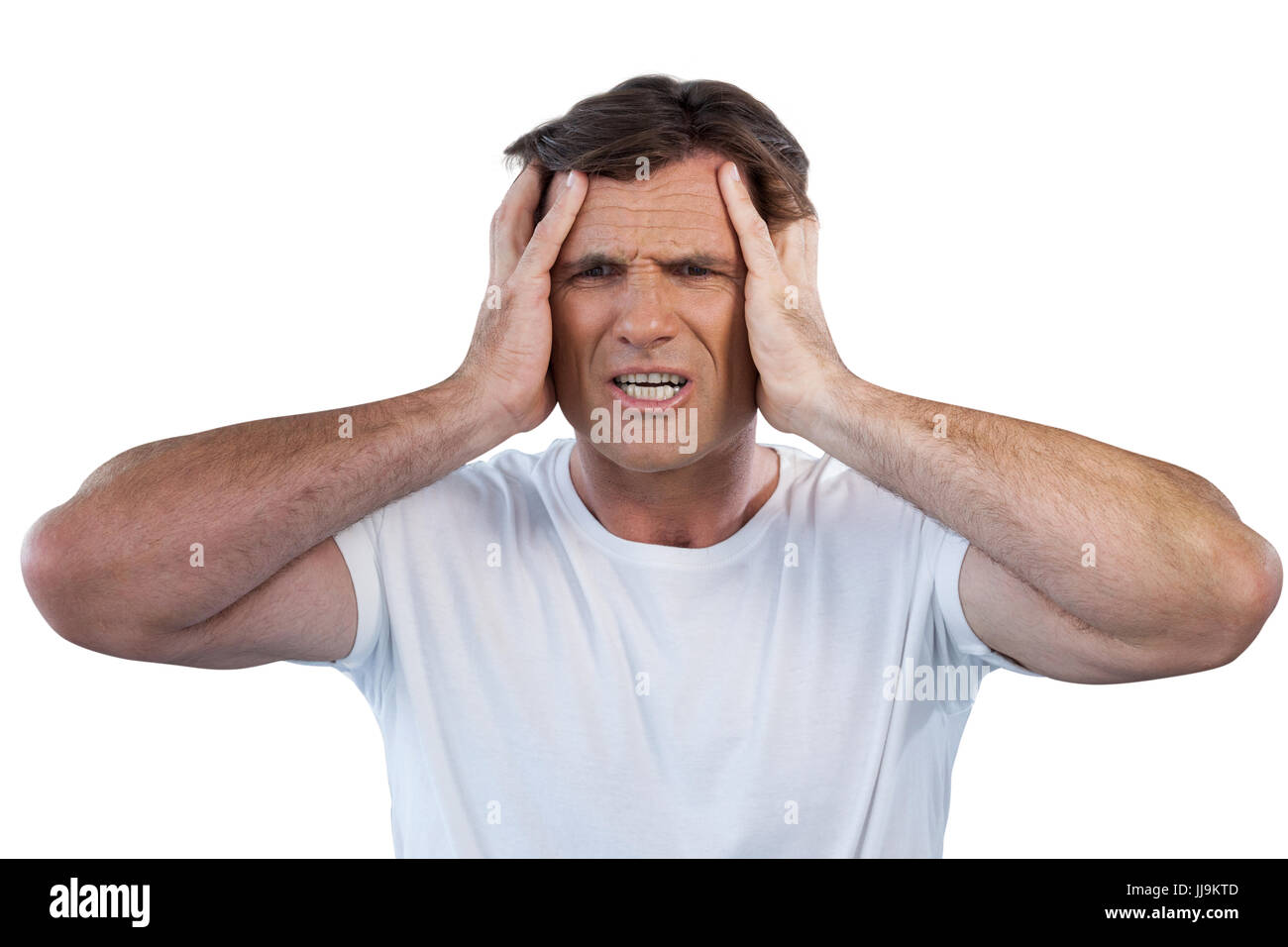 Man with head in hand against white background Stock Photo - Alamy