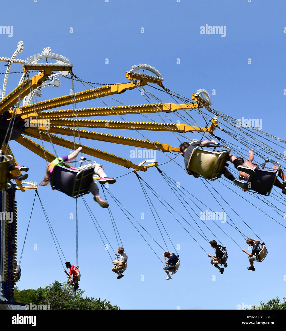 Swing ride at a carnival Stock Photo - Alamy