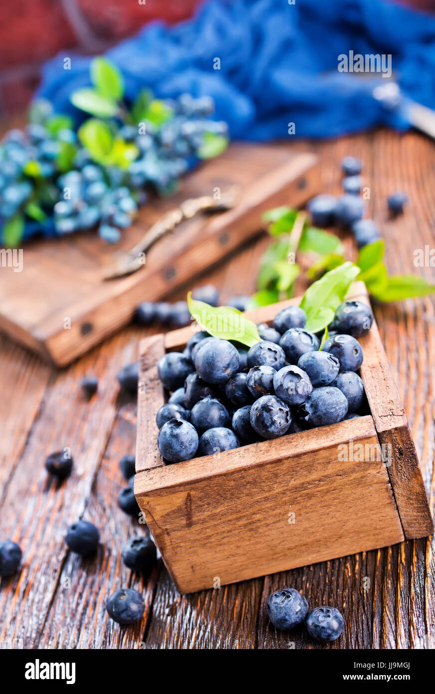 blueberry in wooden box and on a table Stock Photo - Alamy
