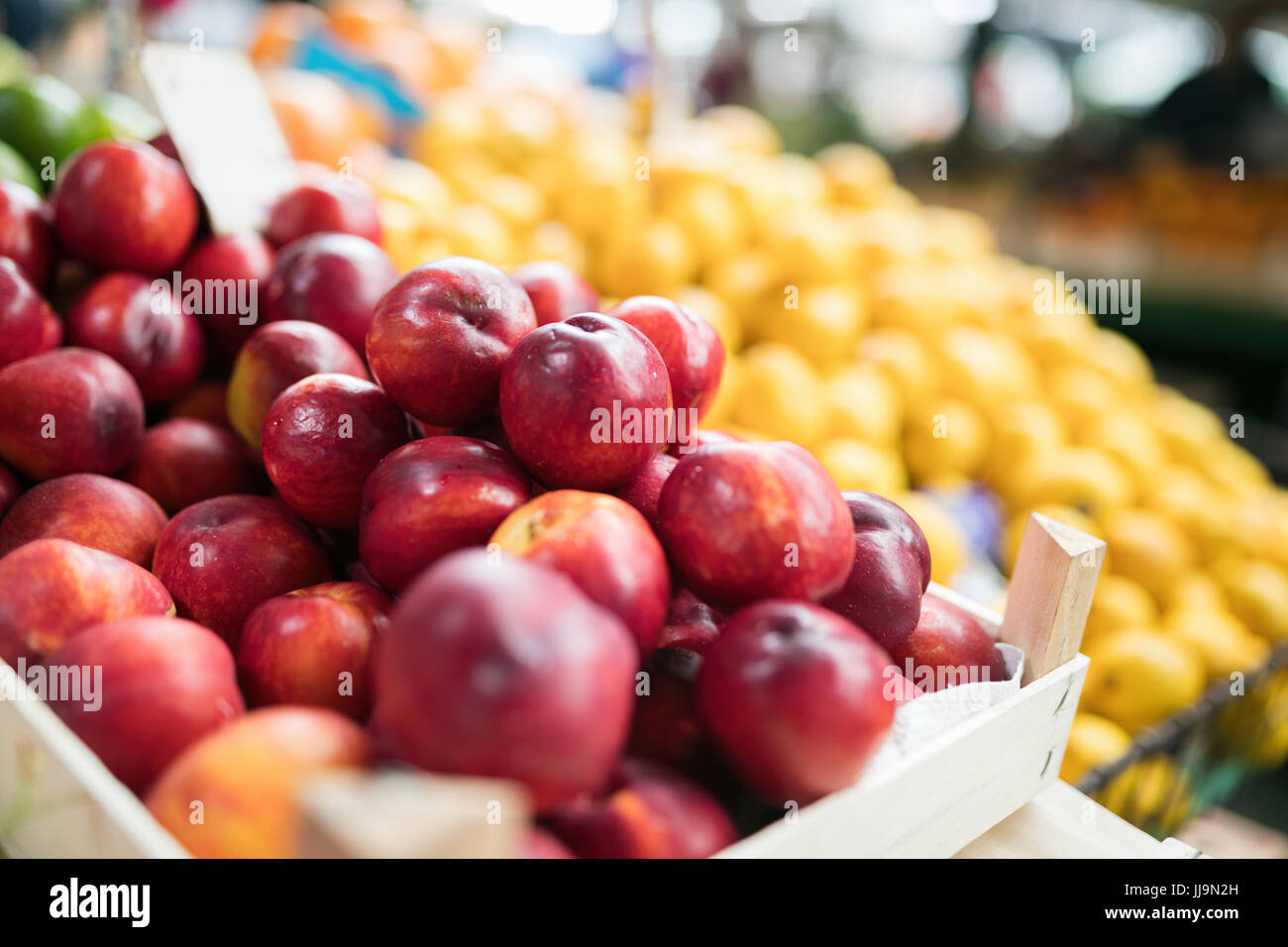 Picture of lot of nectarines in box for sale Stock Photo - Alamy