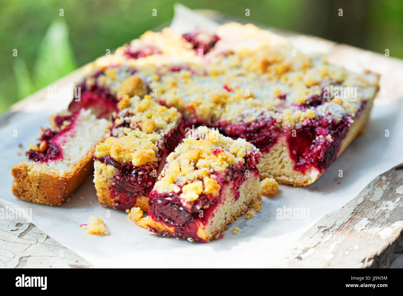 Yeast crumble tray bake cake with cherries Stock Photo - Alamy
