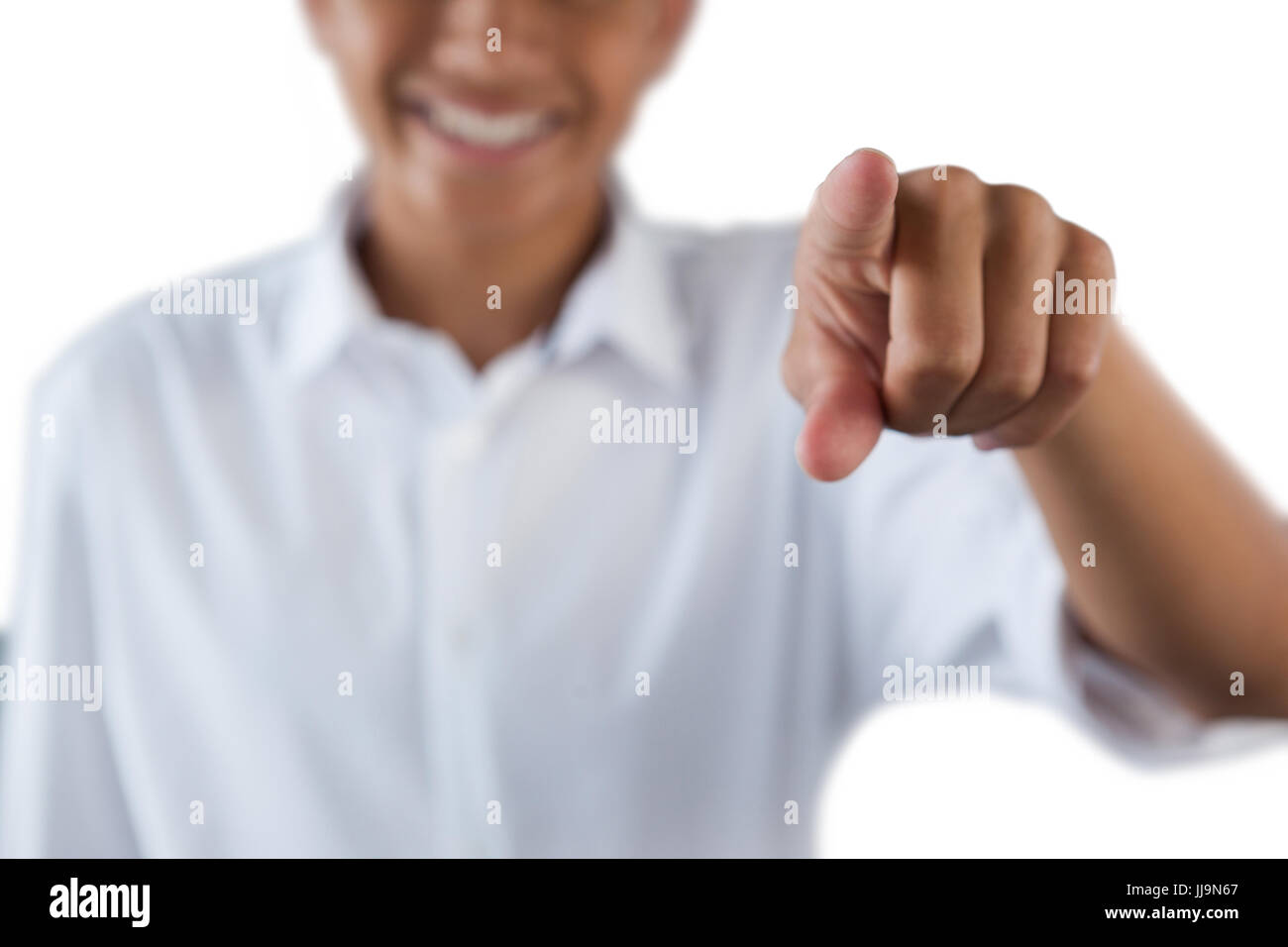Mid section of Teenage boy pressing an invisible virtual screen Stock ...