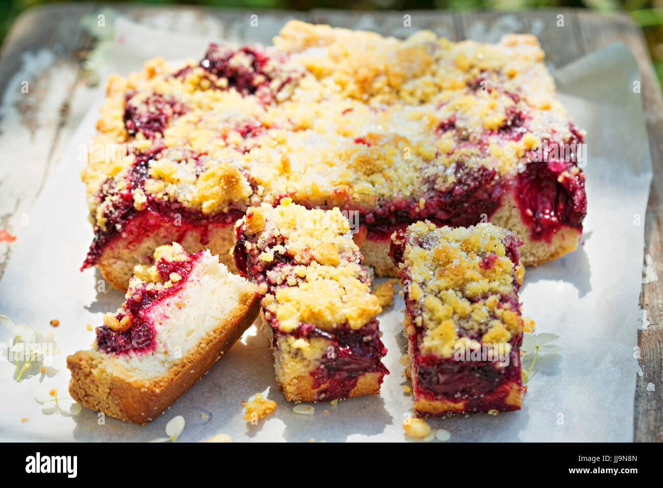 Yeast crumble tray bake cake with cherries Stock Photo - Alamy