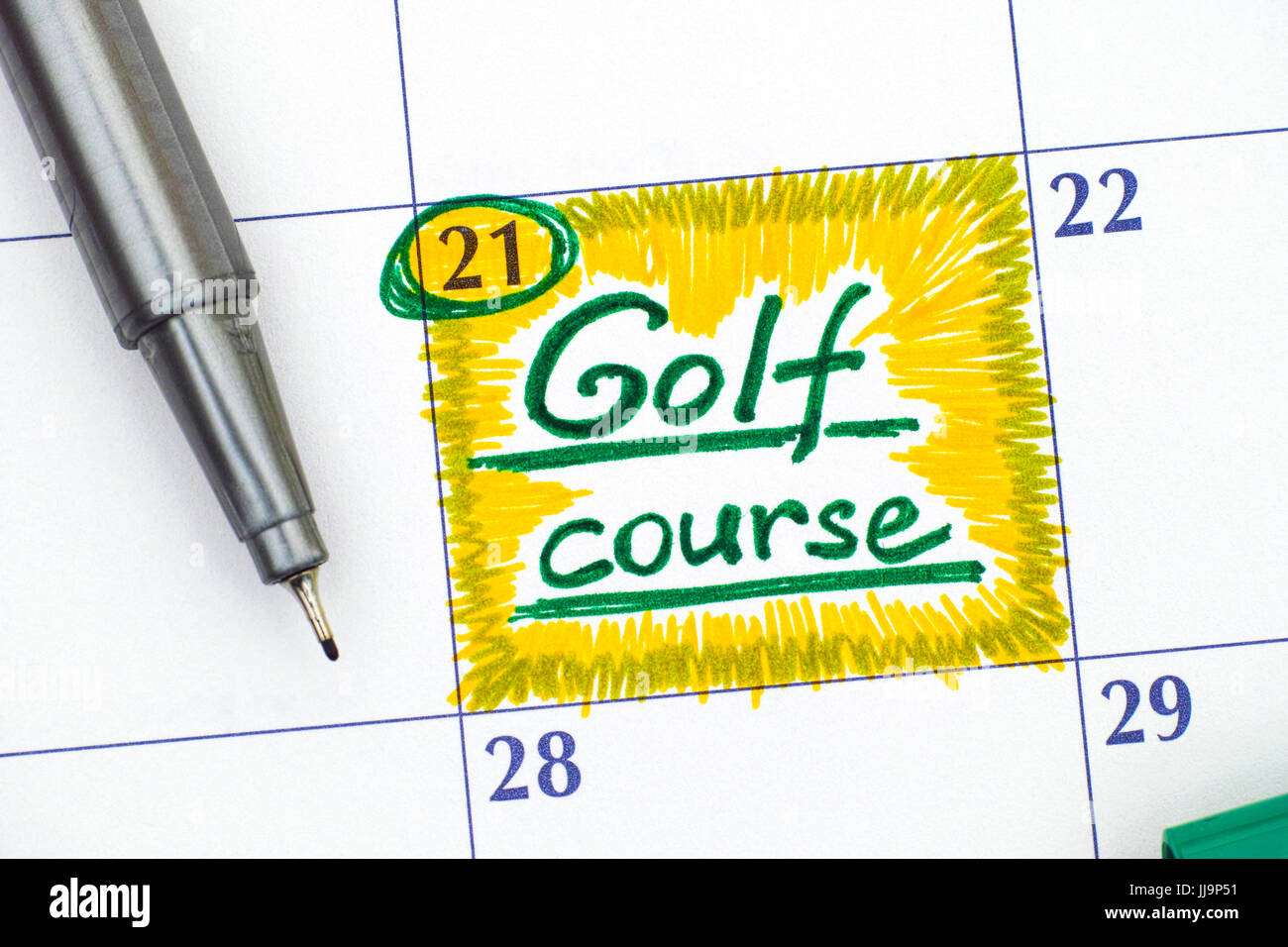 Reminder Golf course in calendar with green pen Stock Photo - Alamy