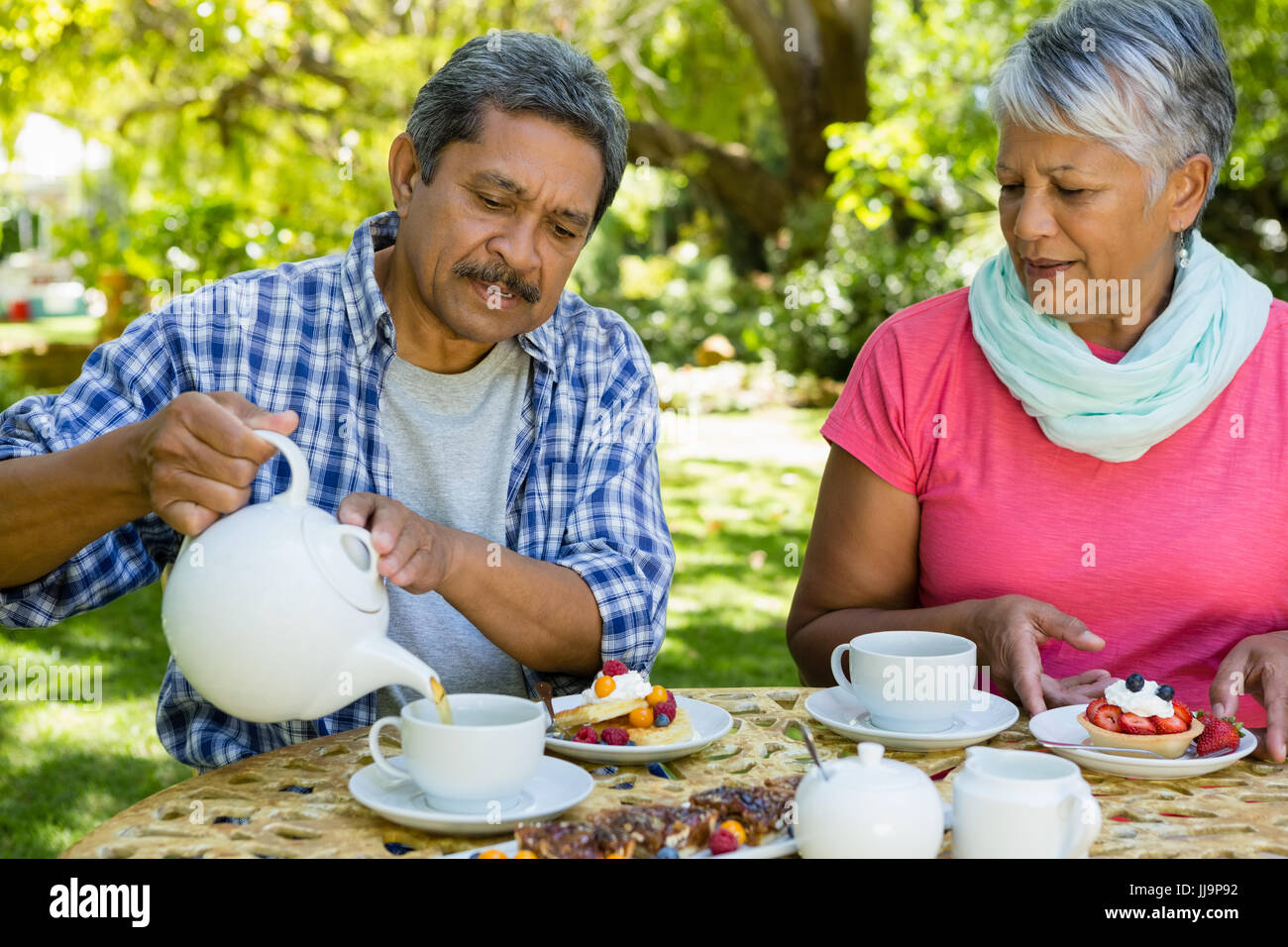 Senior couple tea garden hi-res stock photography and images - Alamy