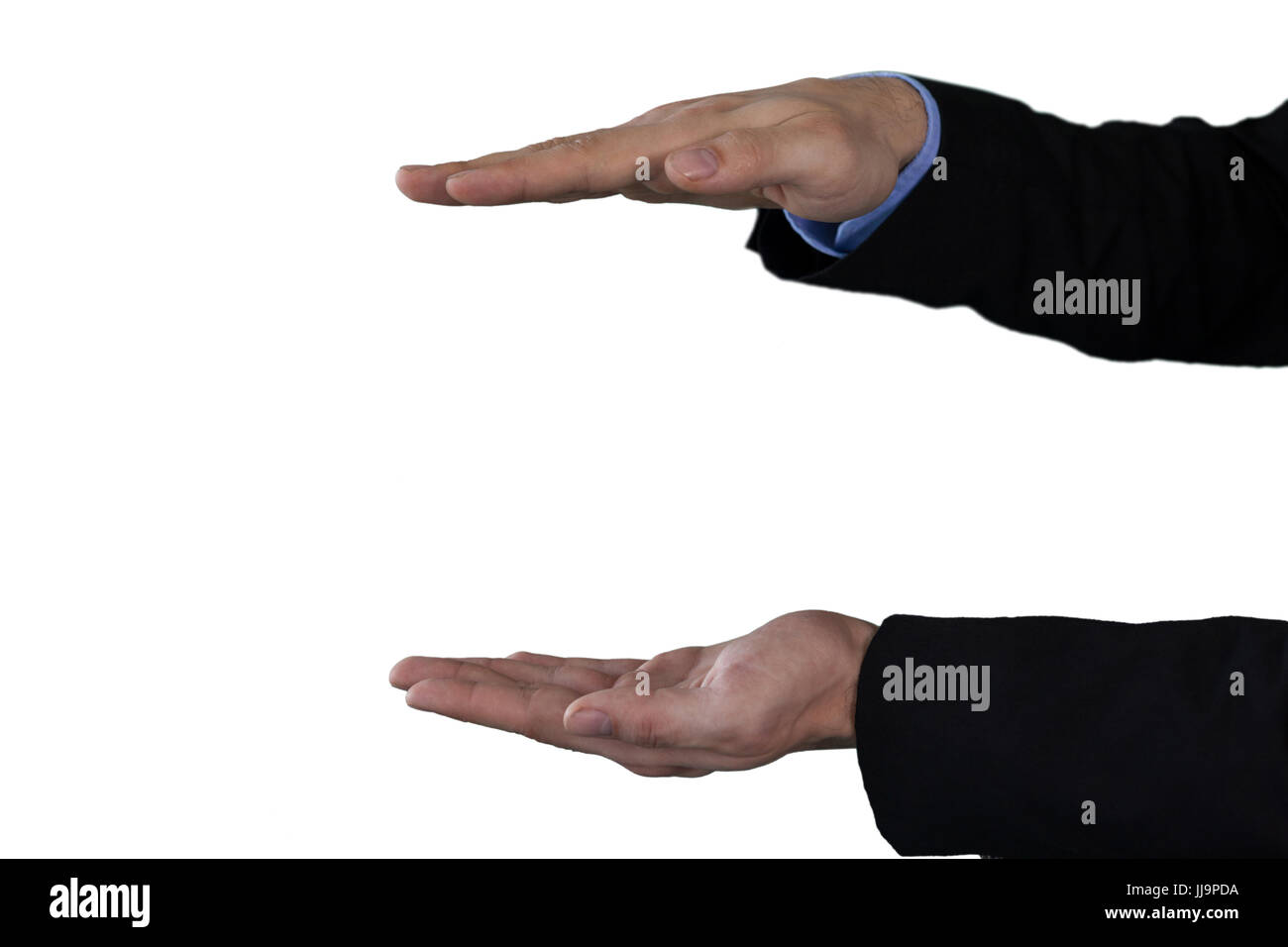 Cropped image of businessman holding invisible product against white ...