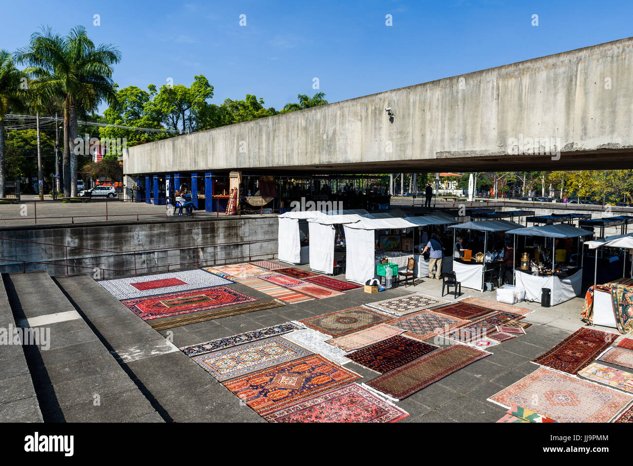 Rugs and market stalls at antique market in Mube Museum Stock Photo - Alamy