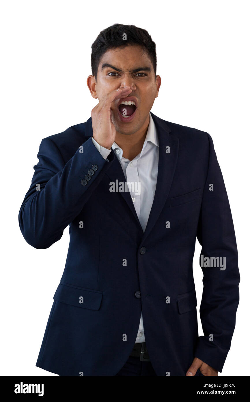 Portrait of businessman shouting against white background Stock Photo ...