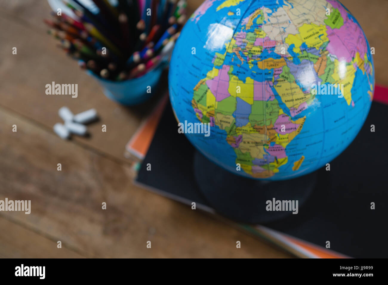 Close up pointing on world globe hi-res stock photography and images ...