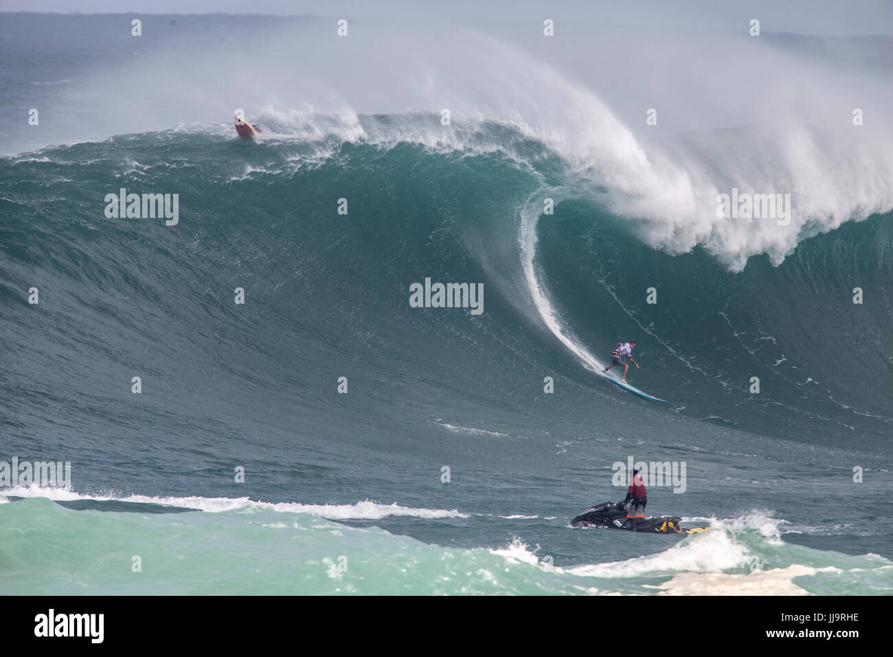 Huge wave surfer hi-res stock photography and images - Alamy