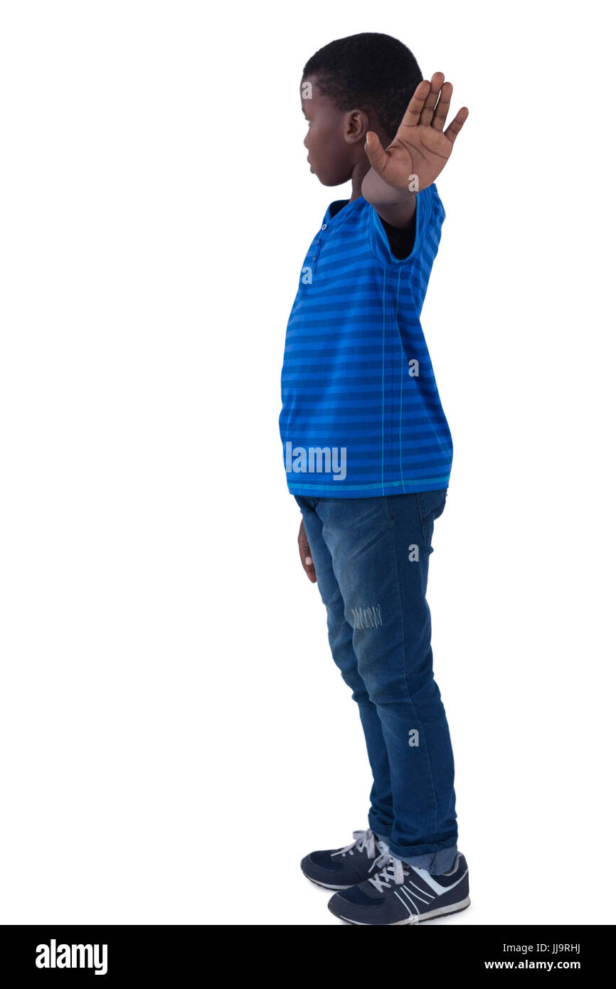 Close-up of cute boy showing his hand while ignoring Stock Photo - Alamy