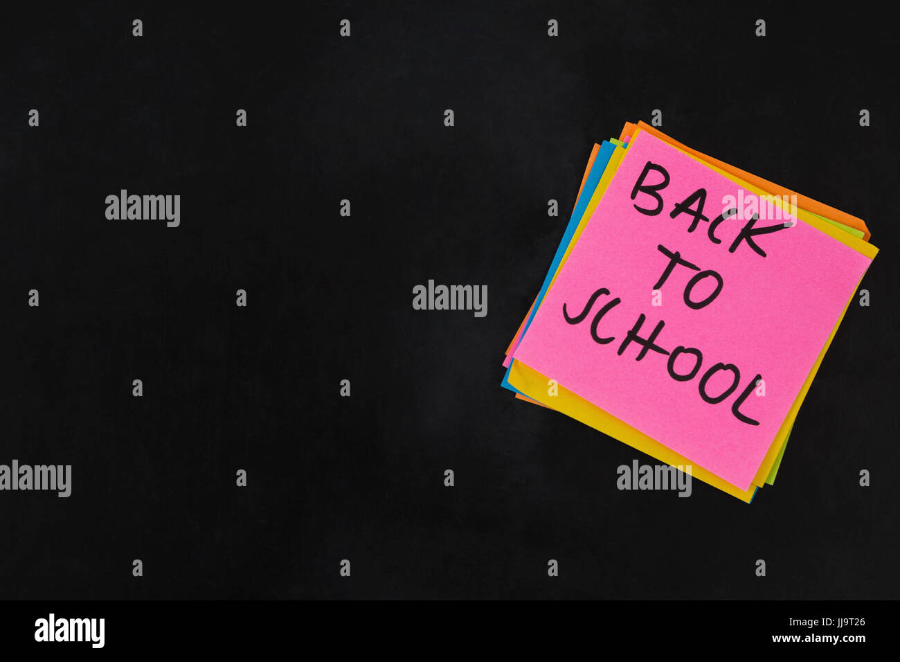 Close-up of back to school text written on sticky note Stock Photo - Alamy