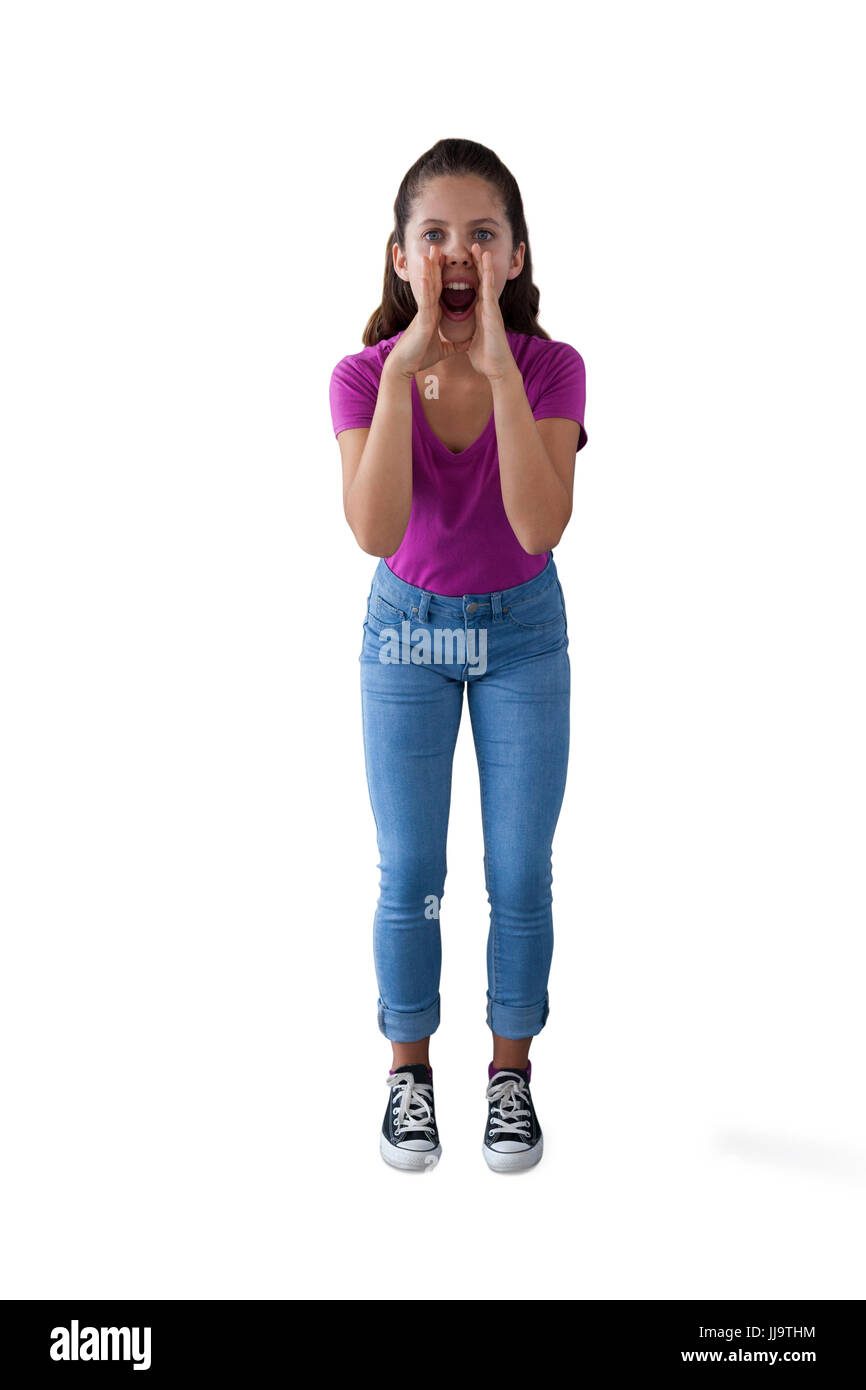 Angry girl screaming against a white background Stock Photo - Alamy