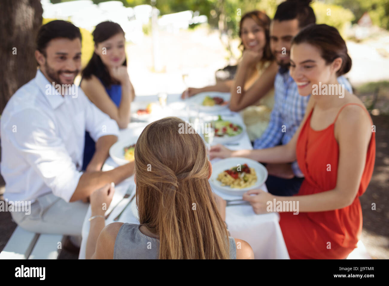 Group of friends having lunch in a restaurant Stock Photo - Alamy