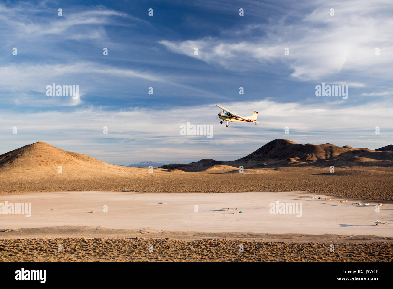 Plane coming in for a landing over the rural Nevada Desert at the High ...
