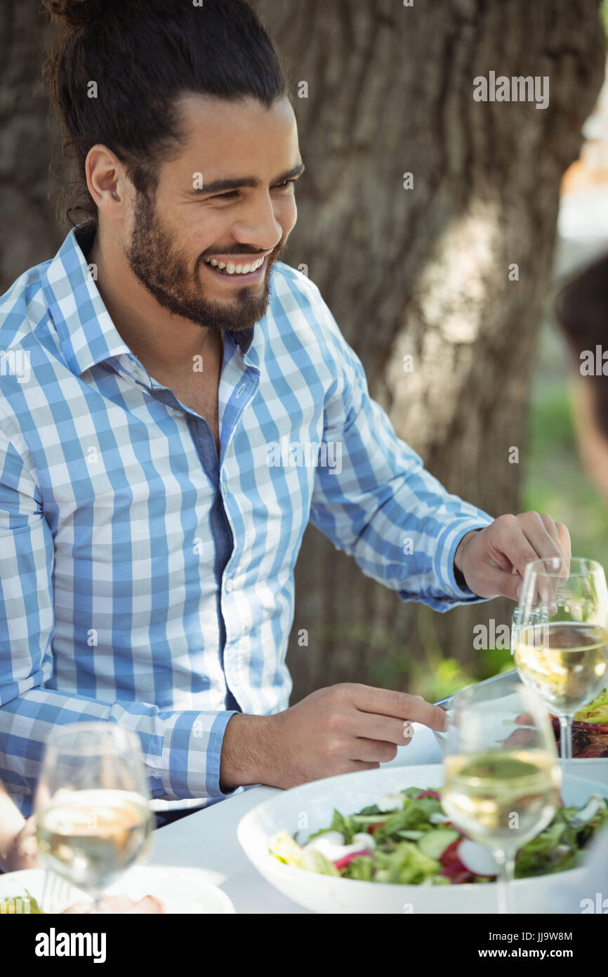 Man having lunch in a restaurant Stock Photo - Alamy