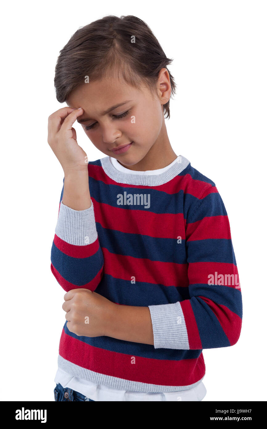 Close-up of cute boy having an headache Stock Photo - Alamy