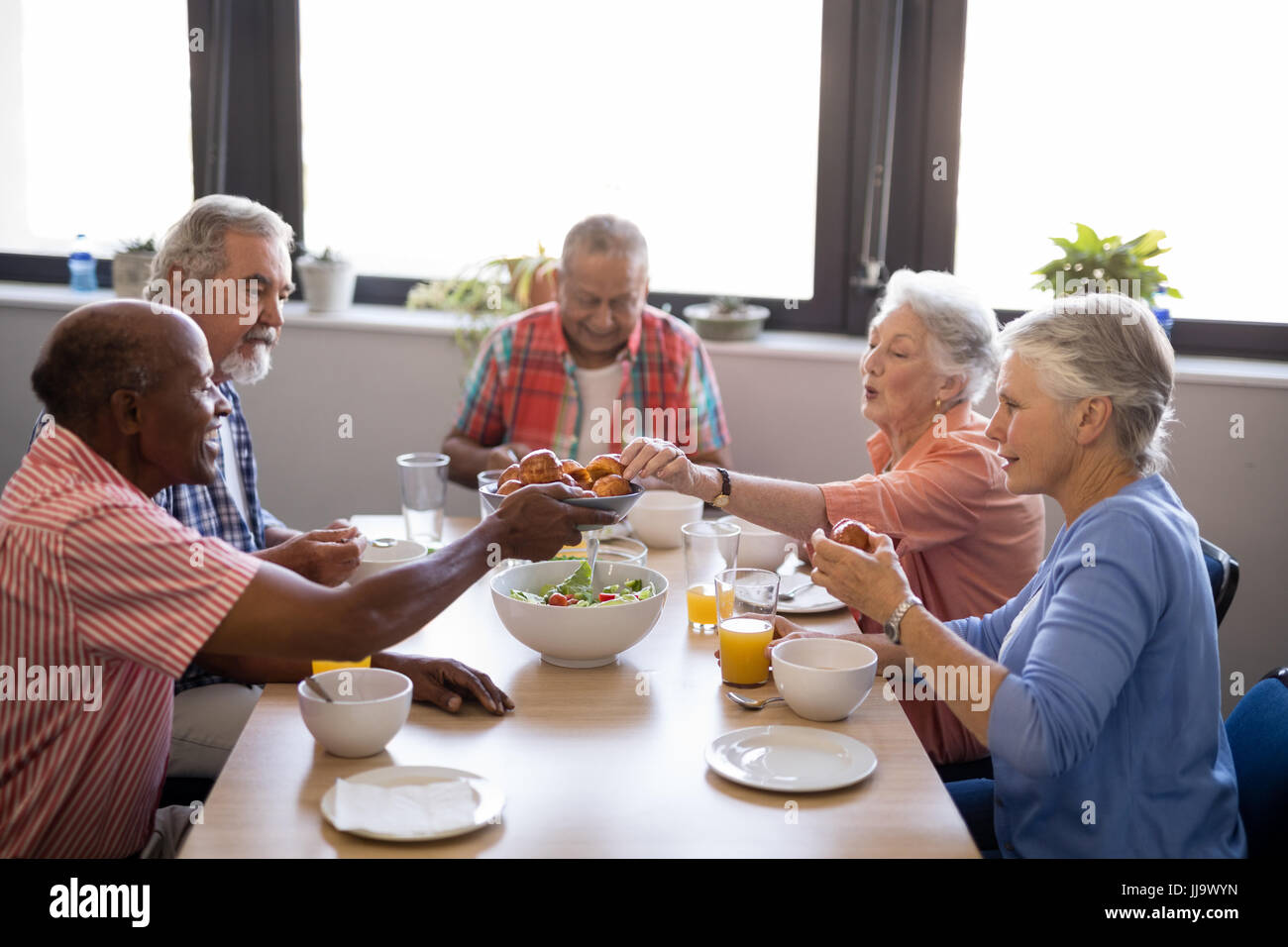 Man giving food hi-res stock photography and images - Alamy