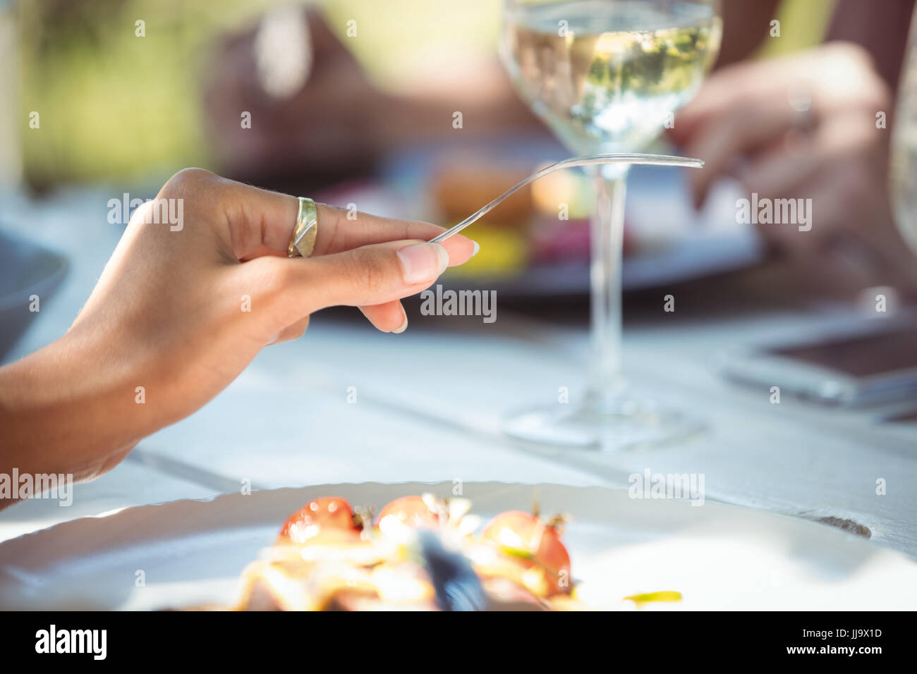 Woman having meal hi-res stock photography and images - Alamy