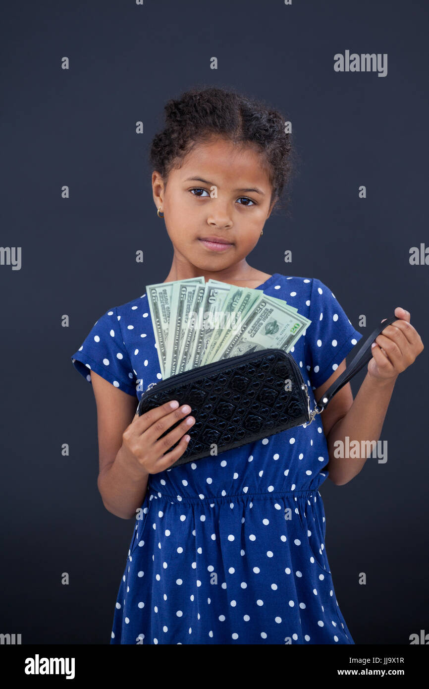 Girl with purse hi-res stock photography and images - Alamy
