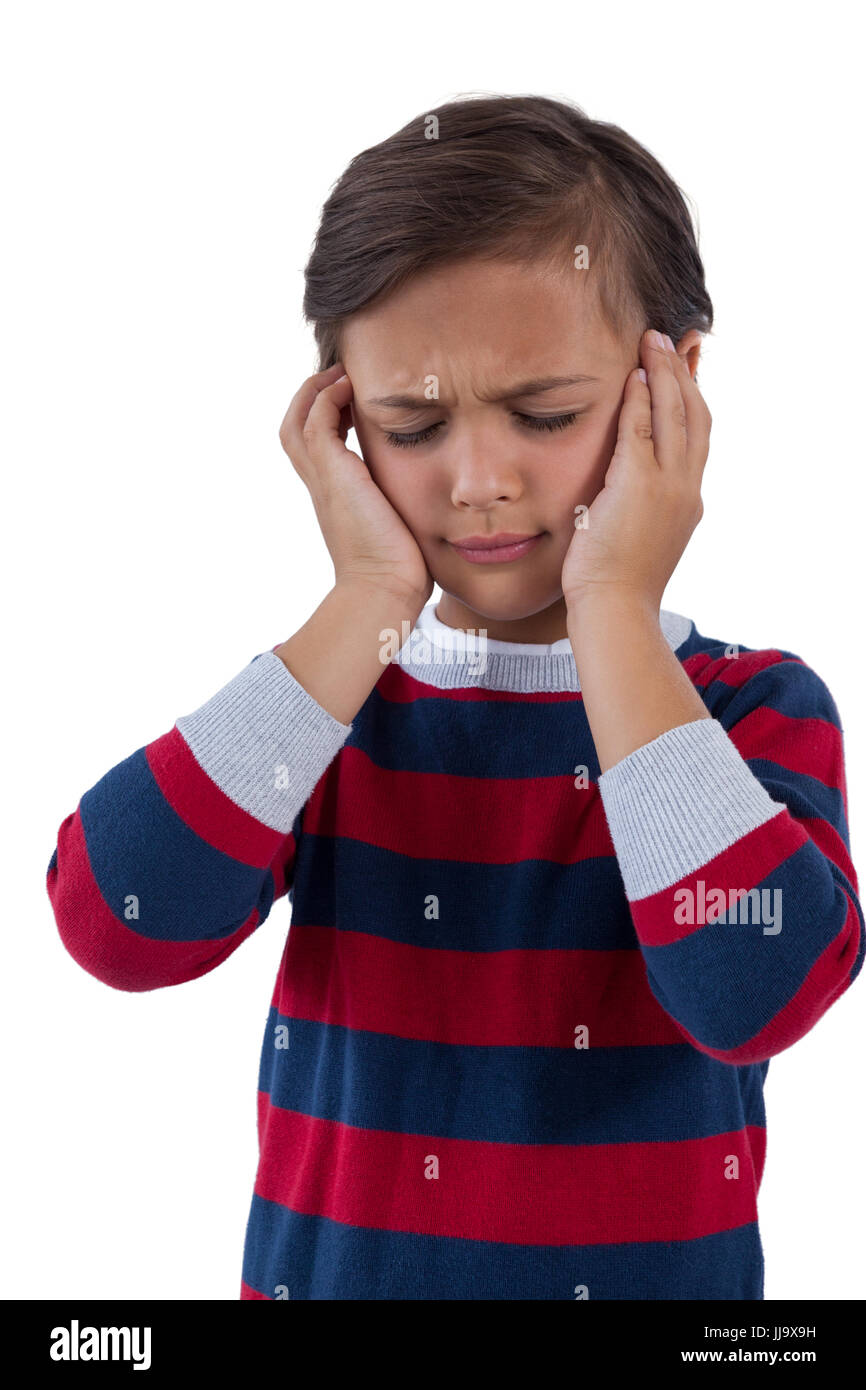 Close-up of cute boy having an headache Stock Photo - Alamy