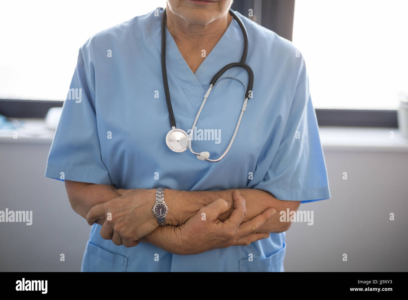 Handsome elderly doctor in uniform hi-res stock photography and images ...