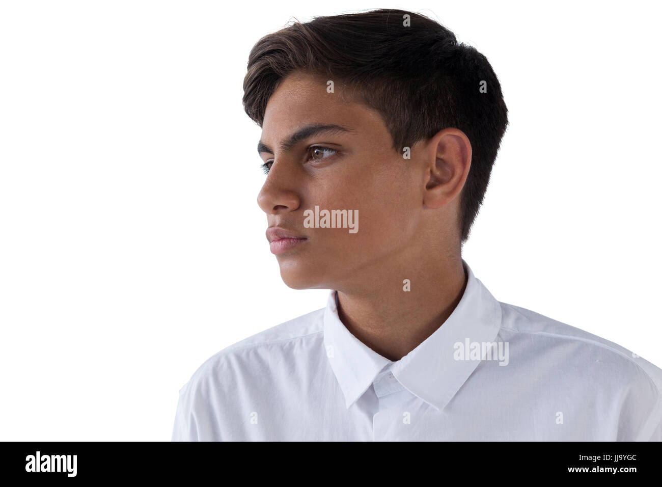 Side view of teenage boy against white background Stock Photo - Alamy