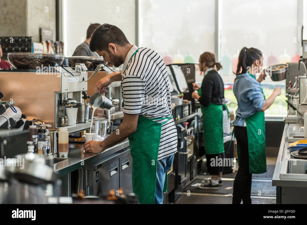 Starbucks barista hi-res stock photography and images - Alamy