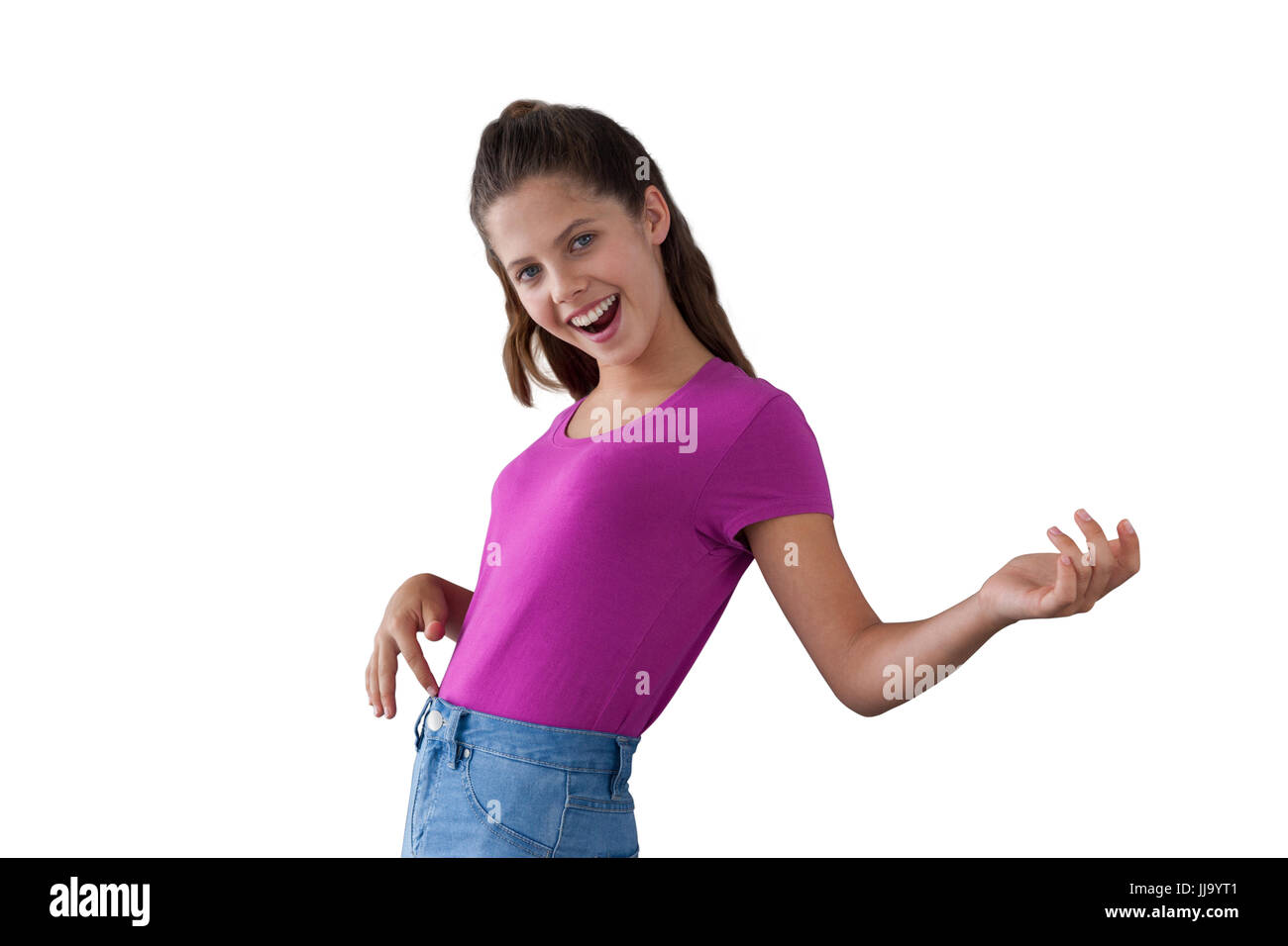 Portrait of smiling girl dancing against white background Stock Photo ...