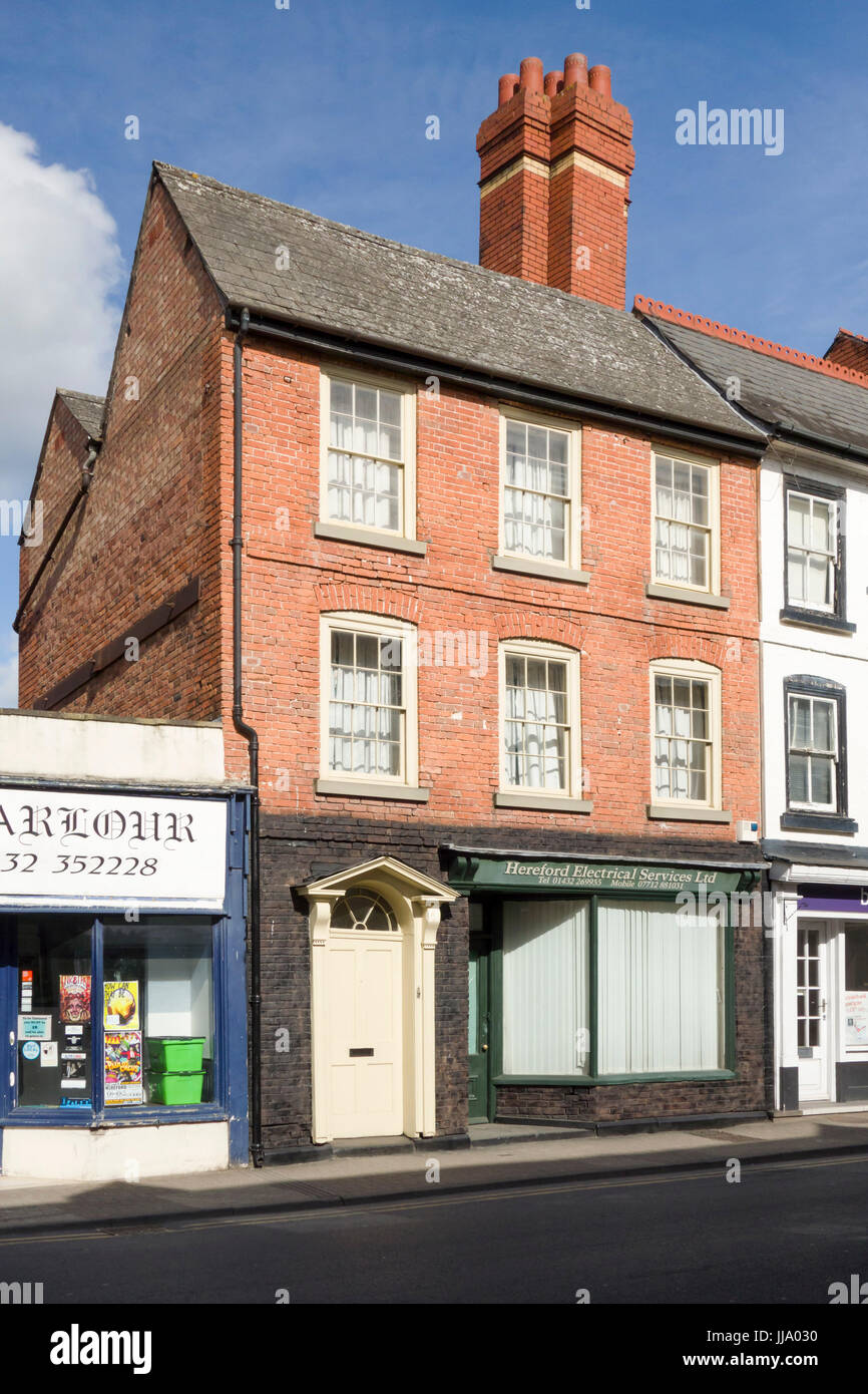 A historic Georgian brick townhouse in Hereford with old-fashioned ...