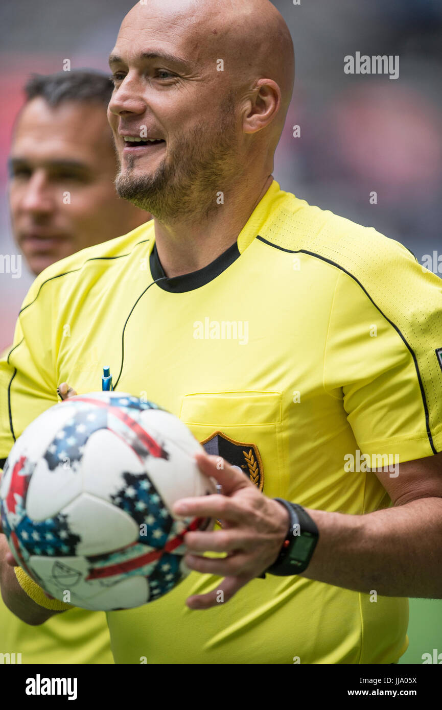 MLS referee Robert Sibiga holding game the game ball before the start ...