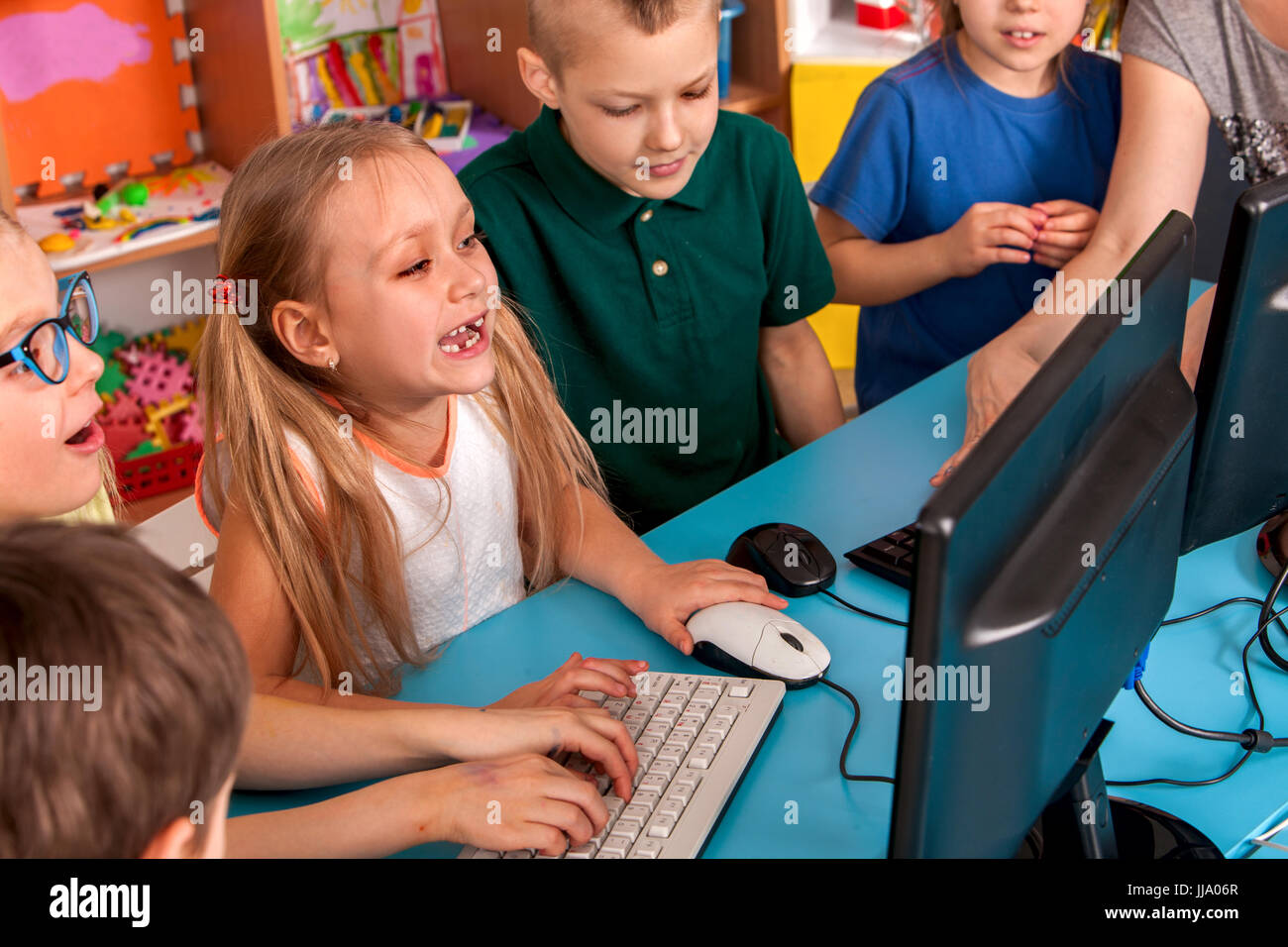 Children computer class us for education and video game Stock Photo - Alamy