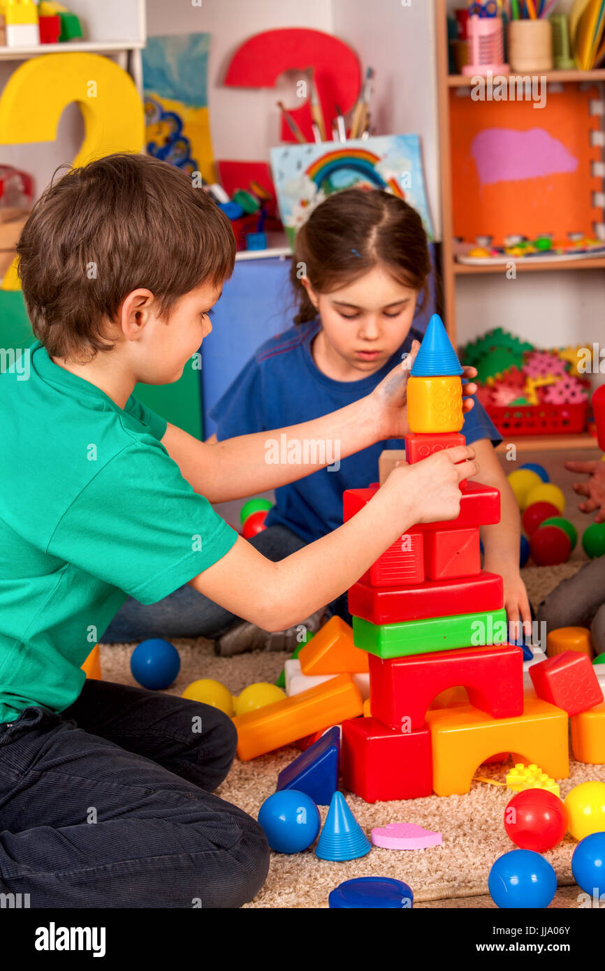 Boy playing building bricks in hi-res stock photography and images - Alamy