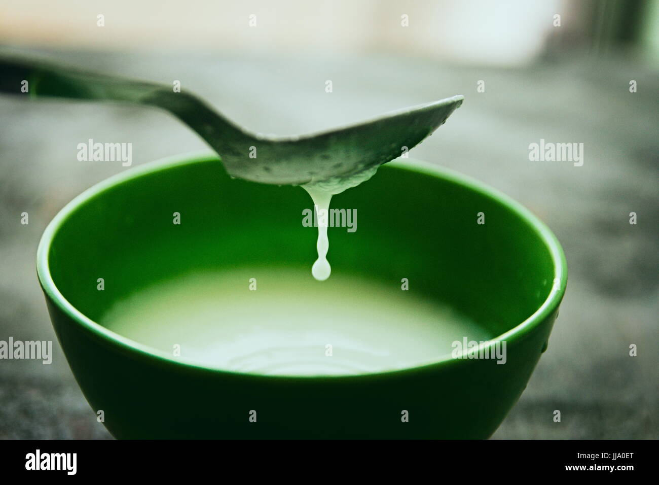 Milk bowl spoon hi-res stock photography and images - Alamy