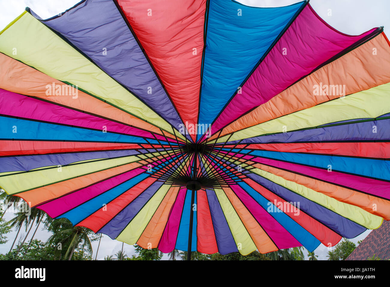 Big red beach umbrella hi-res stock photography and images - Alamy