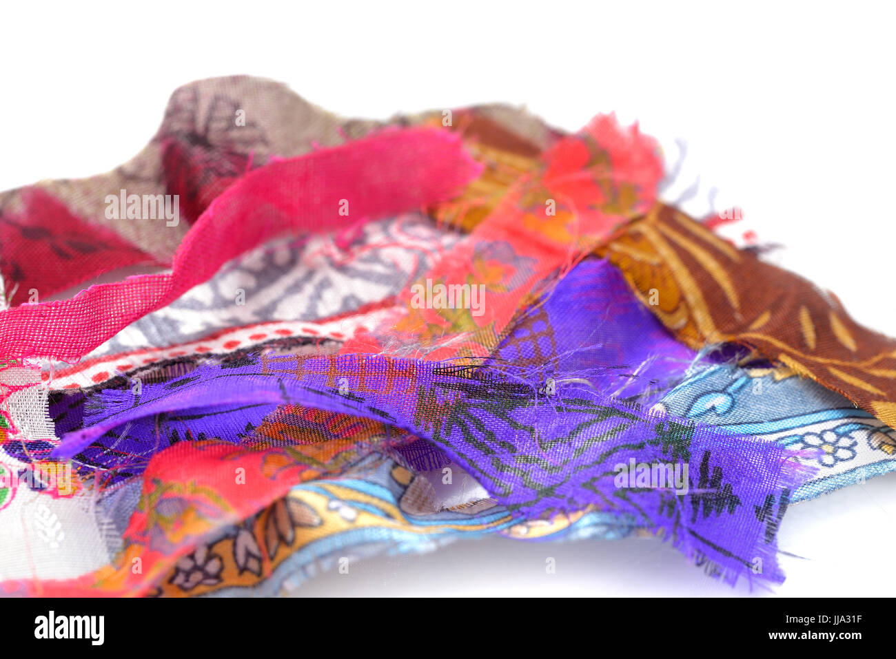 fabric pieces that were left from sewing - fabric pile Stock Photo - Alamy