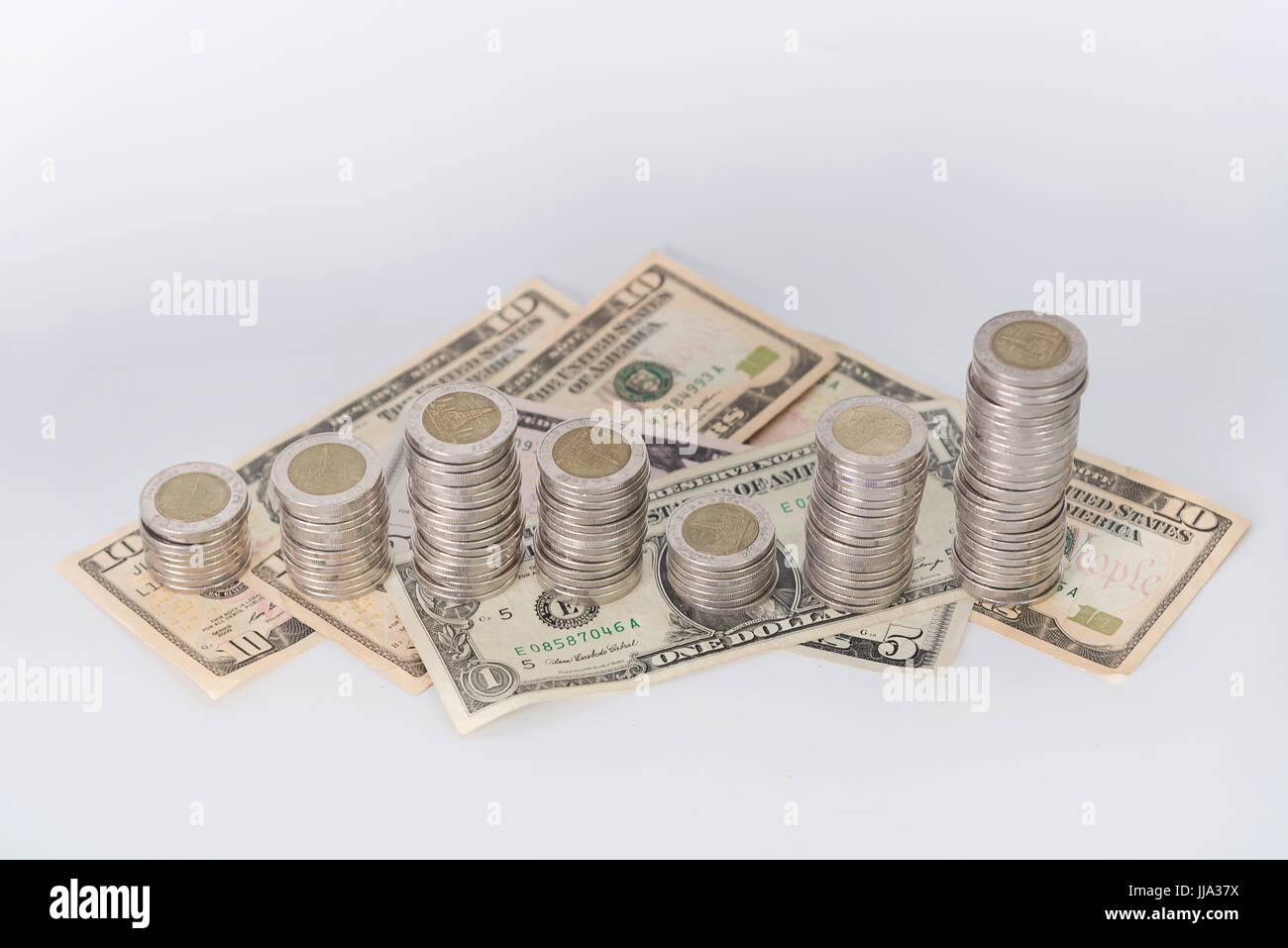 Savings, increasing columns of coins, piles of coins arranged as a ...