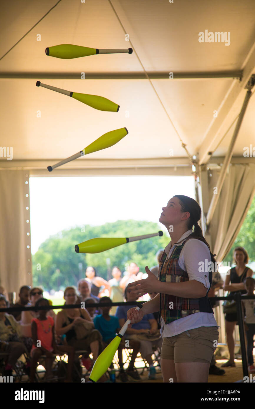 Delaney Bayles, an alumna of Circus Smirkus (Greensboro, Vt.) juggles 5 ...